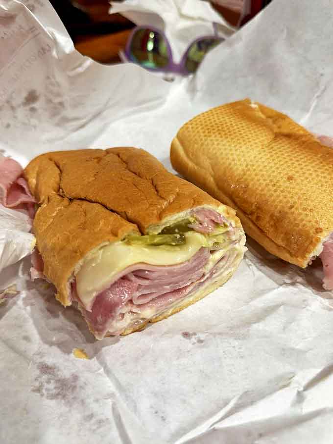 Ham and cheese gets the Louisiana treatment&mdash;layers of thinly sliced meat and melty provolone on that legendary bread. Simple ingredients, extraordinary results.