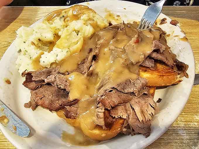 The hot beef sandwich&mdash;where tender roast beef meets gravy-soaked bread in a marriage so perfect it deserves its own anniversary celebration.