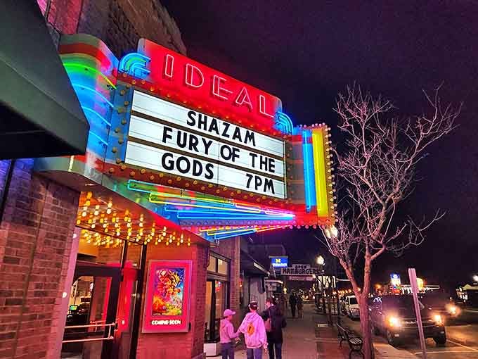The Ideal Theater's neon marquee lights up Clare's nightlife, proving small towns can deliver big-screen magic without big-city prices.