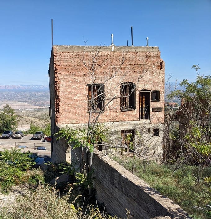 This weathered brick building tells stories of Jerome's resilient past—standing strong despite the town's notorious shifting foundations.