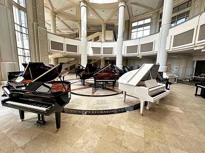 The Stephens Performing Arts Center's piano display is like a keyboard convention where every instrument is saying, "Pick me, I sound better!"