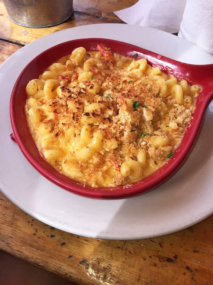 Lobster mac and cheese: where comfort food puts on its fancy pants. The golden breadcrumb topping is like a delicious sunset over pasta sea.