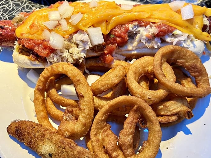 The "Nuclear Waste Dog" comes loaded with enough toppings to fuel a rocket launch. Napkins required, no hazmat suit necessary.