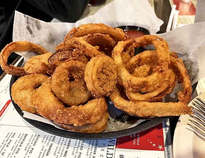 Onion rings that achieve the perfect crisp-to-tender ratio &ndash; like edible golden halos for the truly deserving.
