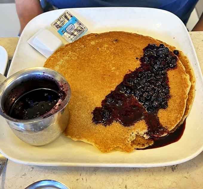 These pancakes aren't just breakfast, they're an event. That blueberry compote could make even IHOP executives weep with jealousy.