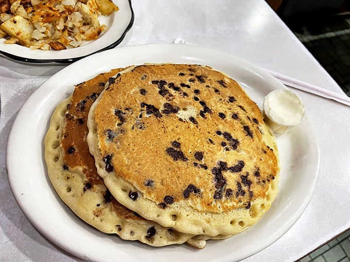 These blueberry pancakes aren't just breakfast &ndash; they're edible frisbees of joy, with each purple burst a tiny flavor explosion waiting to happen.