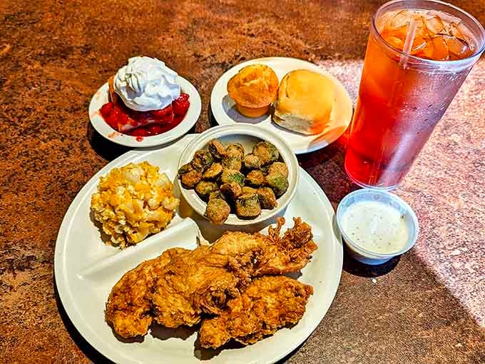 When your plate needs its own ZIP code: fried chicken, mac and cheese, fried okra, and rolls that deserve their own fan club.