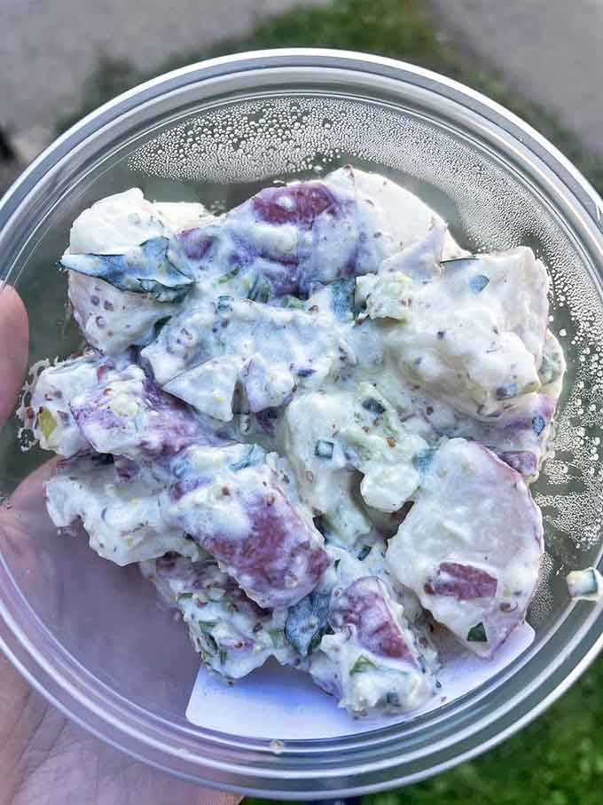 Potato salad that makes picnic memories jealous. Those purple potatoes aren't just showing off&mdash;they're bringing flavor to the party.