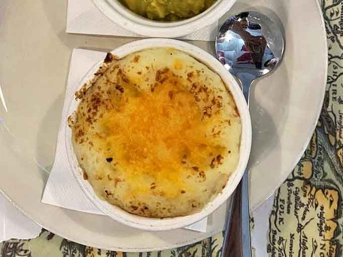 Shepherd's Pie done right is poetry on a plate. This bubbling masterpiece of savory filling crowned with golden-brown mashed potatoes is what comfort food dreams are made of.