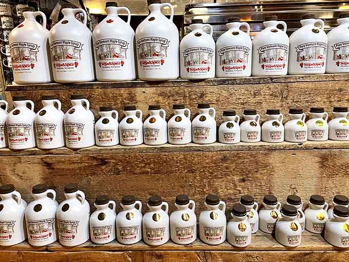 Liquid treasure lines these shelves. Each jug contains Vermont's most precious export &ndash; maple syrup in various grades, from delicate golden to robust dark amber.