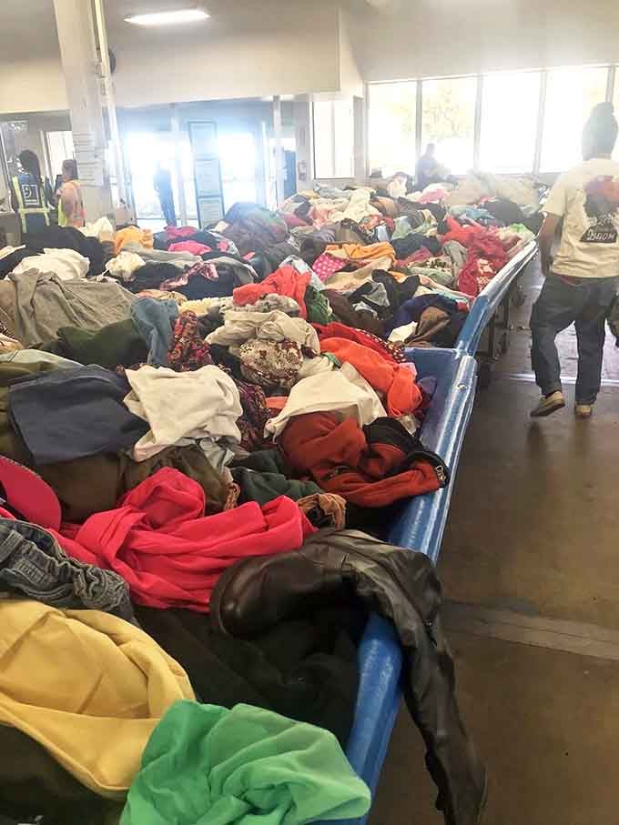 A sea of textiles awaiting new homes. In this fabric free-for-all, yesterday's fashion finds tomorrow's appreciative audience.