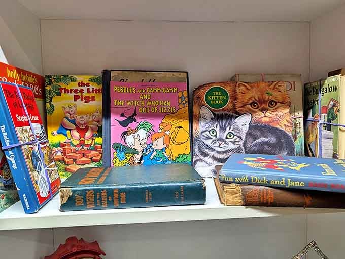 Childhood classics line these shelves! From Dick and Jane to those kitten books that somehow survived generations of sticky fingers.