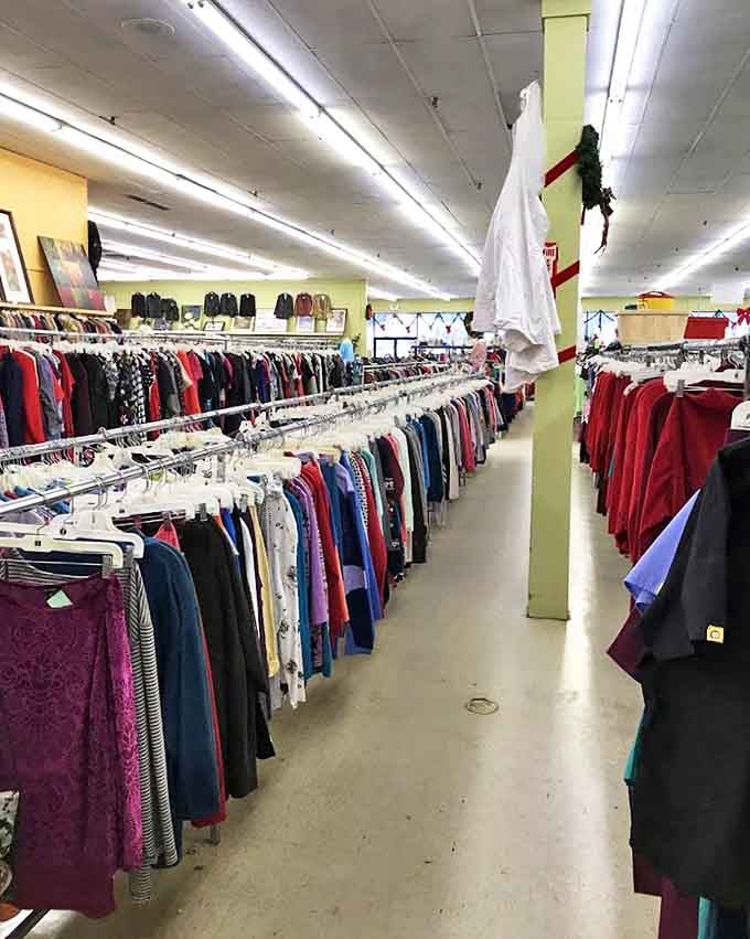 Rainbow rows of possibility. Each hanger holds not just clothing, but someone's potential next favorite outfit waiting to be discovered.