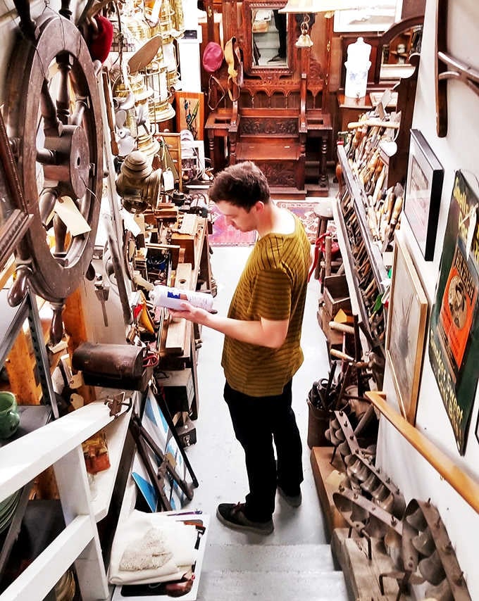 Narrow aisles become tunnels of discovery where even the most casual browser might stumble upon that one perfect piece they never knew they needed.