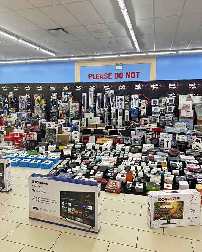 Electronics paradise where TVs, monitors, and gadgets gather in impressive numbers. It's like the island of misfit tech—except everything works perfectly.