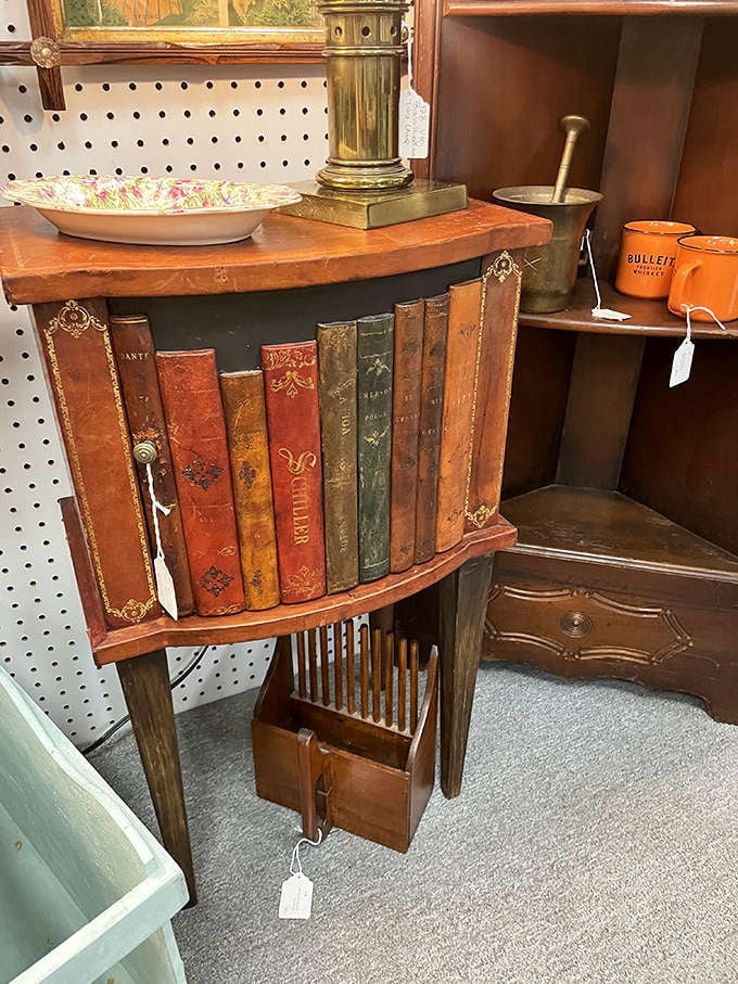 Leather-bound classics arranged like a literary rainbow. Books that were treasured before becoming treasures themselves.