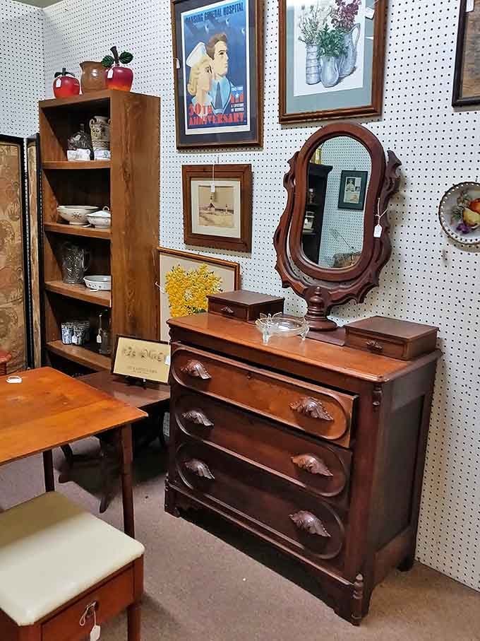 This antique dresser with vanity mirror isn't just furniture; it's a portal to mornings past when getting ready was an event.