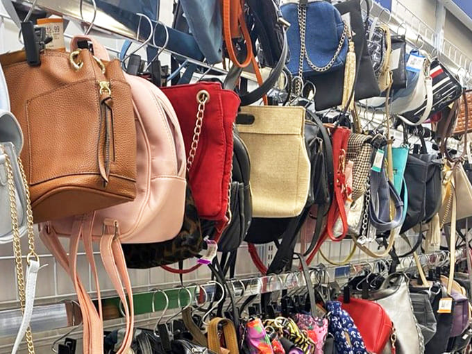 Handbag heaven! Designer dreams and practical purses hanging like colorful tropical fruit, ripe for the picking at fraction-of-retail prices.