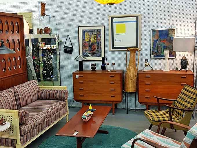 A mid-century living room vignette so perfect you half-expect to see Ward Cleaver reading the evening paper in that plaid chair.