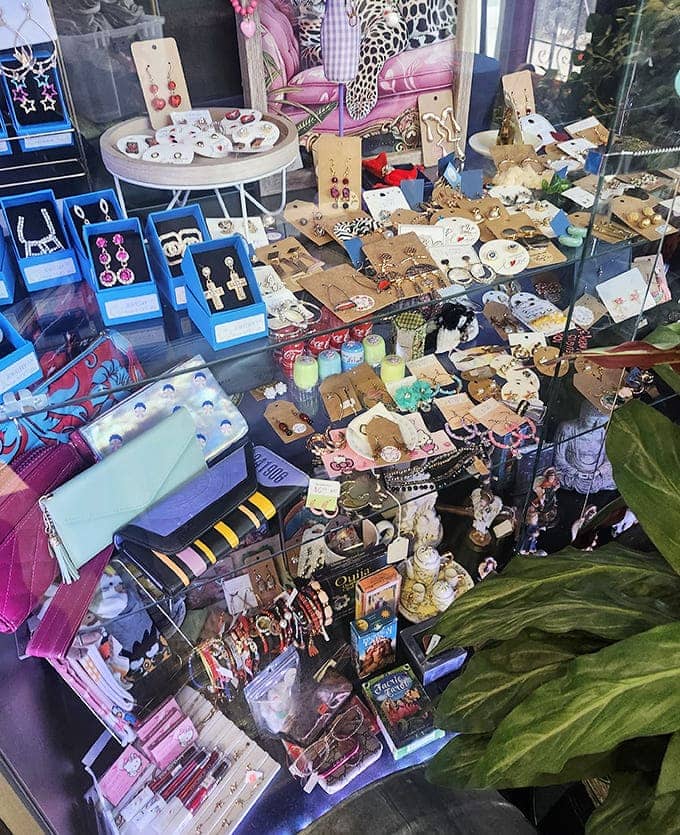 Treasure hunters, take note! This jewelry display contains more potential conversation starters than a celebrity talk show.