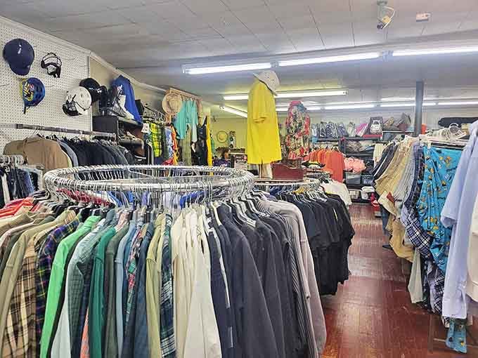 Men's shirts stand at attention, a kaleidoscope of patterns and colors that would make any capsule wardrobe enthusiast weak at the knees.