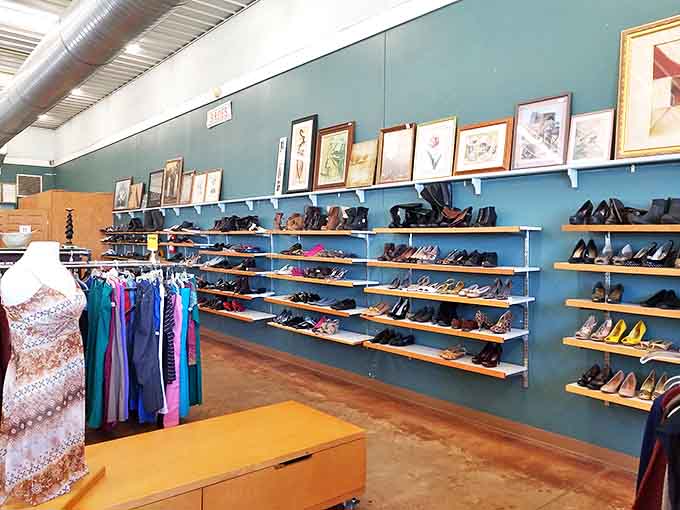 The shoe wall&mdash;where practical meets whimsical. From sensible loafers to statement heels, each pair waits for someone to walk a mile in them.