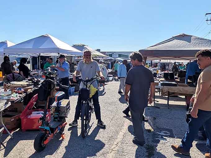 The outdoor section transforms into a community gathering spot where strangers become temporary allies in the quest for bargains.