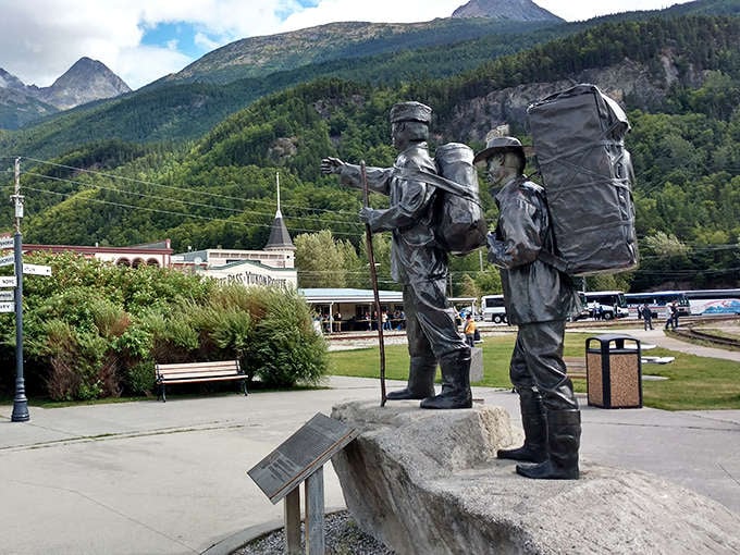 These bronze stampeders forever climbing toward dreams of Klondike gold remind us that the journey itself often becomes the real treasure.