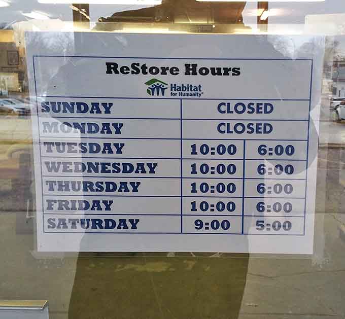 The store hours sign reveals the treasure hunt schedule&mdash;closed Sundays and Mondays, but ready for bargain seekers Tuesday through Saturday.