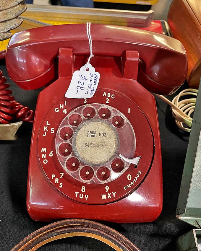 Before smartphones ruled our lives, this cherry-red rotary beauty connected households to the world. Now it's vintage gold for collectors and movie set designers.