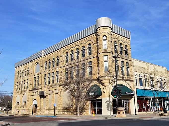 The historic buildings of Arkansas City stand shoulder to shoulder, creating a downtown skyline with more character than height.