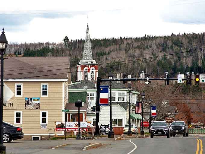 Fort Kent's church spire reaches skyward, a landmark in this affordable northern gem. French-Acadian culture meets New England charm at Maine's top edge.