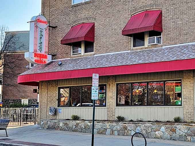 Gianni's occupies one of Wilmington's most distinctive buildings. Those red awnings pop against the stone like pepperoni on cheese.