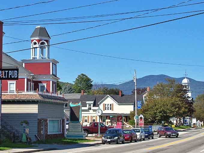 Gorham's historic buildings stand like friendly sentinels against mountain backdrops. That red building has probably witnessed more town gossip than a barber shop.