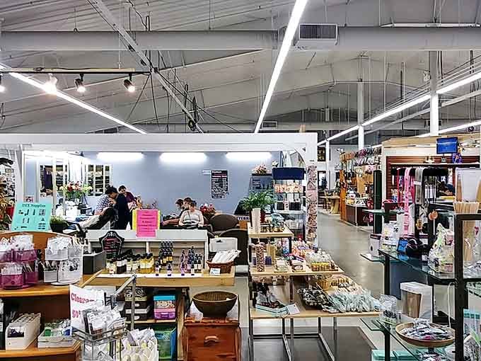 Modern displays showcase carefully curated treasures in this bright, airy space where vintage meets contemporary shopping style perfectly.