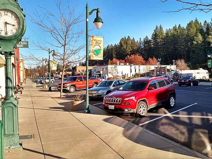 That charming green street clock welcomes you to downtown Palouse, where time moves slower and neighbors actually wave.