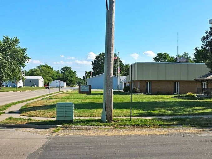 Roxana welcomes visitors with this modern community building. The clean white structure stands out against the winter landscape.