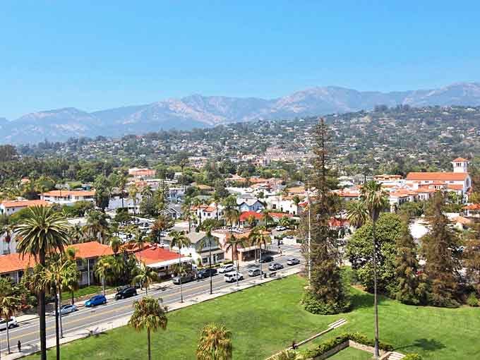 Santa Barbara's palm-lined streets and mountain backdrop create the perfect romantic setting. The American Riviera lives up to its name with this postcard-perfect view.