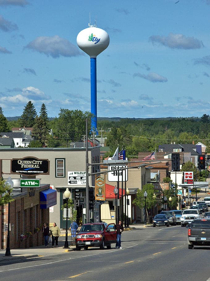 The iconic blue and white water tower watches over Ely's main street, a sentinel guarding this gateway to wilderness adventures.