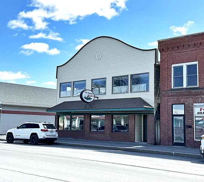 Downtown Fort Kent welcomes with modest storefronts and honest prices. This border town proves retirement paradise doesn't need a fancy zip code.
