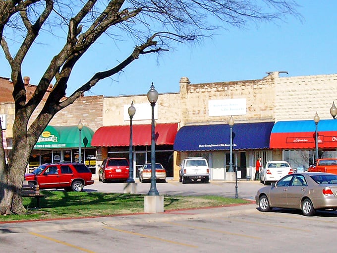Colorful awnings and friendly local businesses line Mountain Home's streets, creating a welcoming community perfect for retirees.