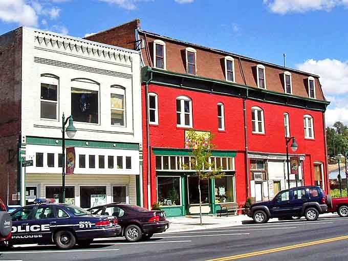 Historic brick buildings line Main Street in Palouse, painted in colors that make every day feel like a postcard.