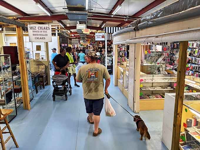 This bustling indoor marketplace buzzes with the energy of serious shoppers on successful treasure hunts.