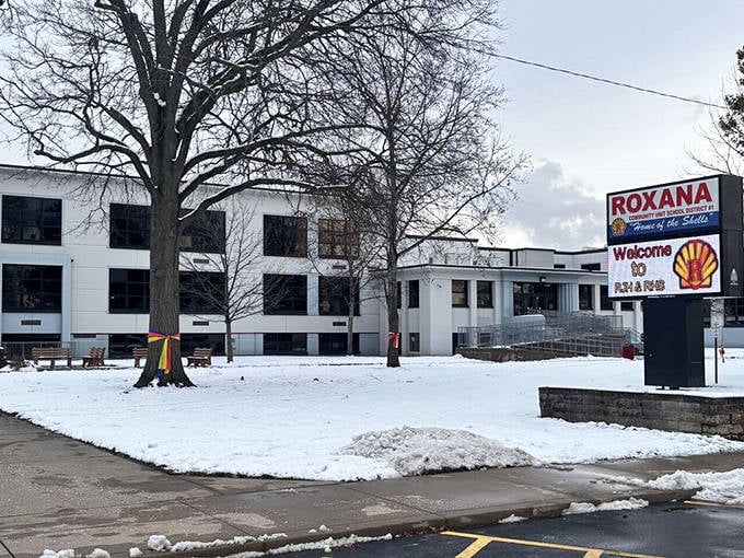 Even in winter, Roxana's community buildings maintain their welcoming appearance. The "Home of the Shells" sign greets all who arrive.
