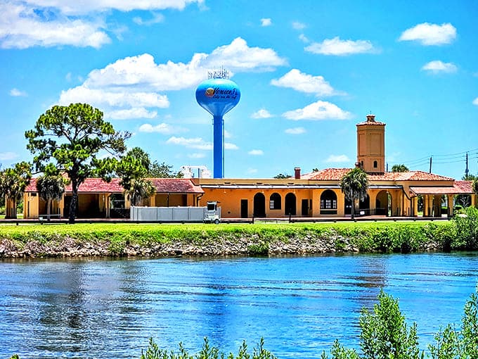 The historic Venice train depot stands sentinel by the water, a reminder of slower times when journeys themselves were the destination.