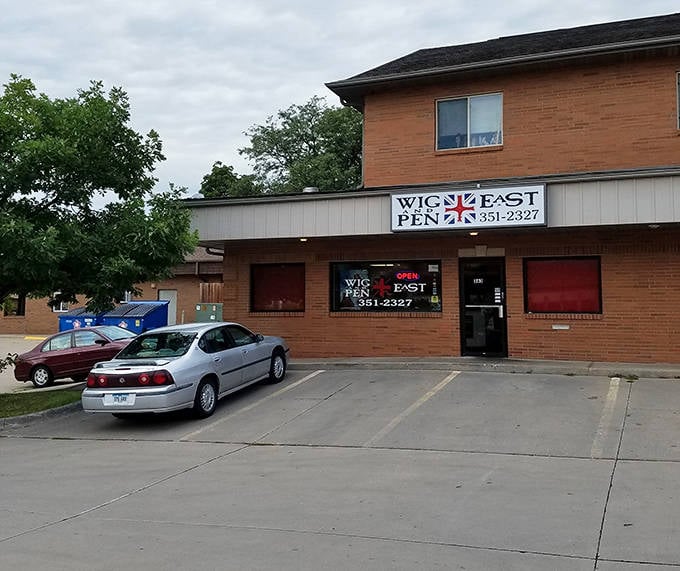 Cars line up outside this neighborhood pizza joint where the British flag logo promises an unexpected Anglo-Italian flavor adventure.