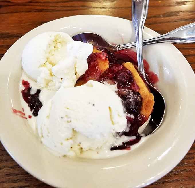 Blackberry cobbler &agrave; la mode&mdash;where summer fruit meets vanilla ice cream in a warm embrace that feels like a hug from your favorite grandma.