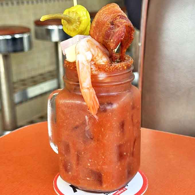 Not just a Bloody Mary&mdash;it's a liquid brunch with enough garnishes to count as a small appetizer. That bacon strip is basically saying "You're welcome."