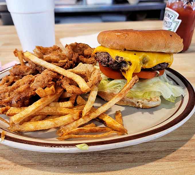 This isn't just a burger – it's a masterpiece of melted cheese, fresh vegetables, and beef that makes fast food chains weep with inadequacy.