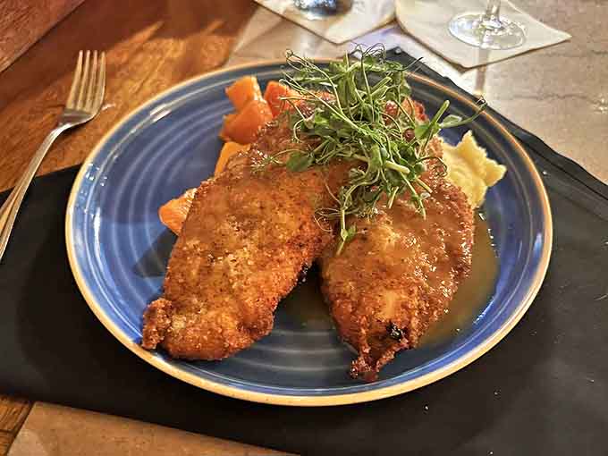 Golden-crusted chicken that's had more careful attention than most of us get at the spa, resting on a bed of vegetables.